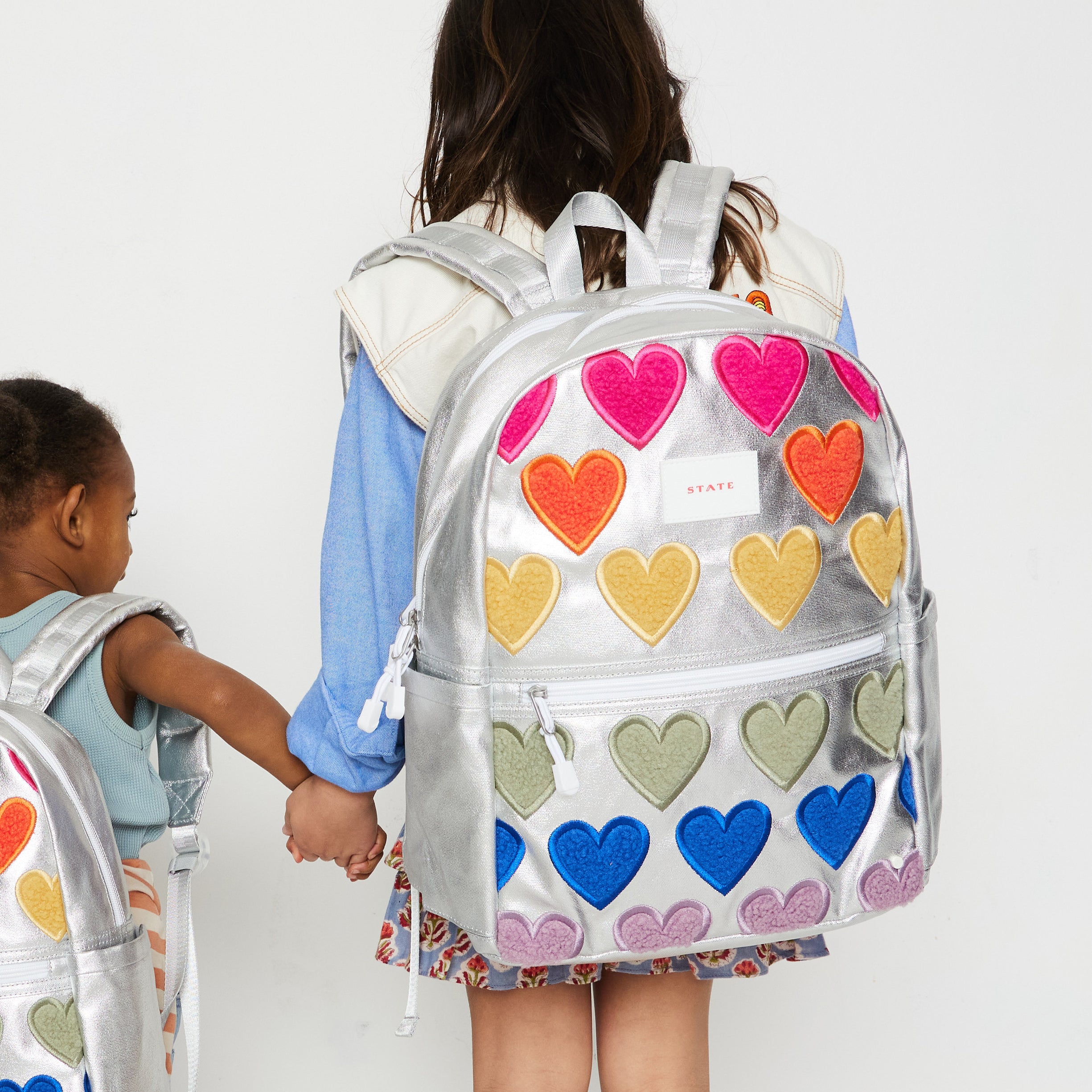 STATE Bags | Kane Kids Double Pocket Backpack Metallic Fuzzy Hearts